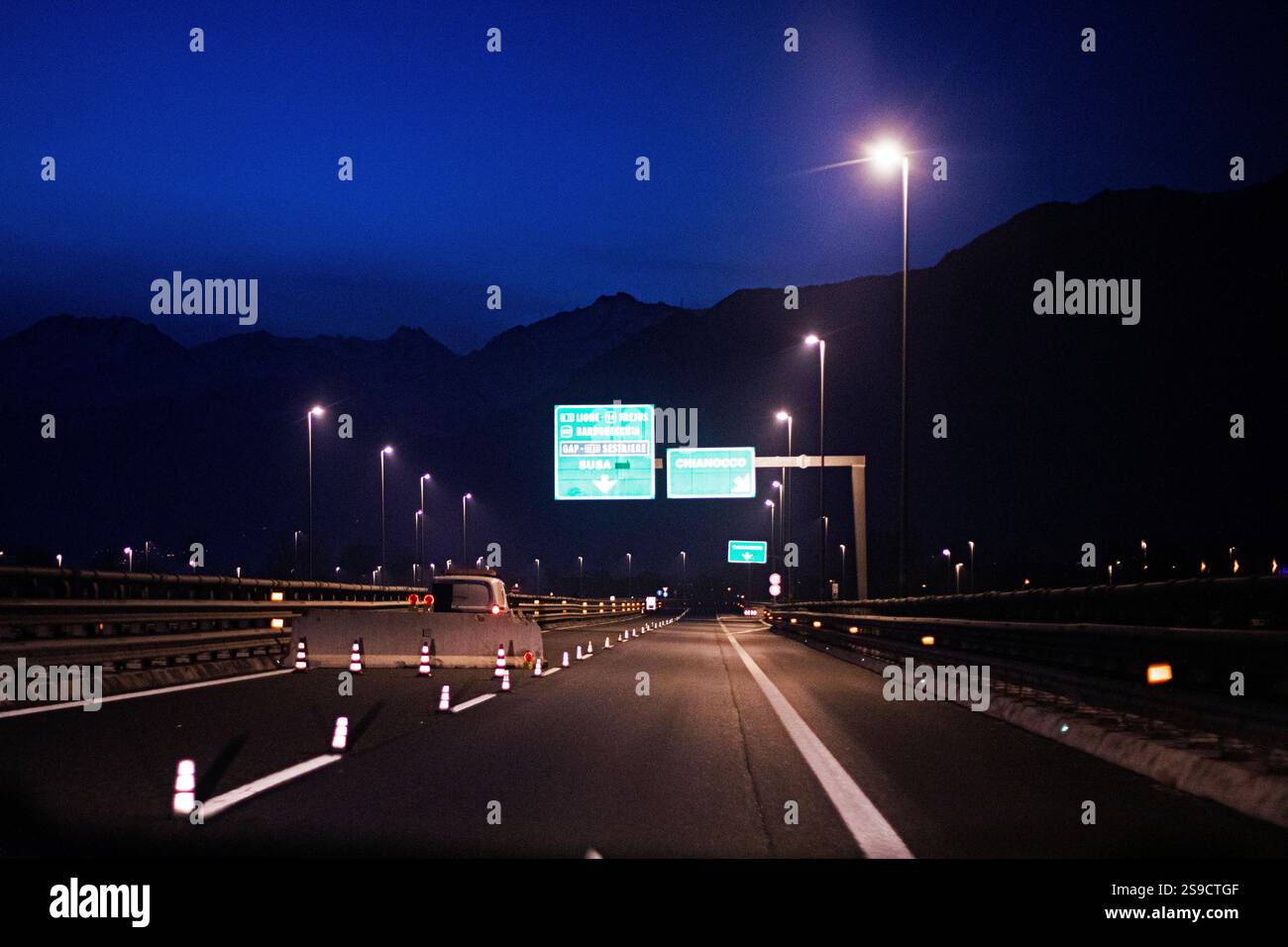 illuminated toll road in Europe at night. car travel Stock Photo - Alamy