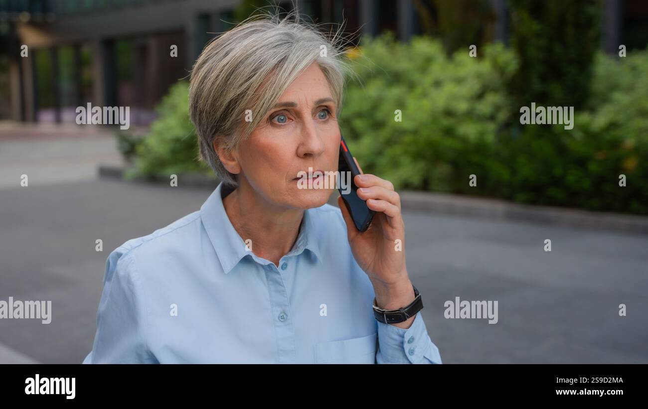 Dissatisfied woman ceo calling smartphone hi-res stock photography and ...