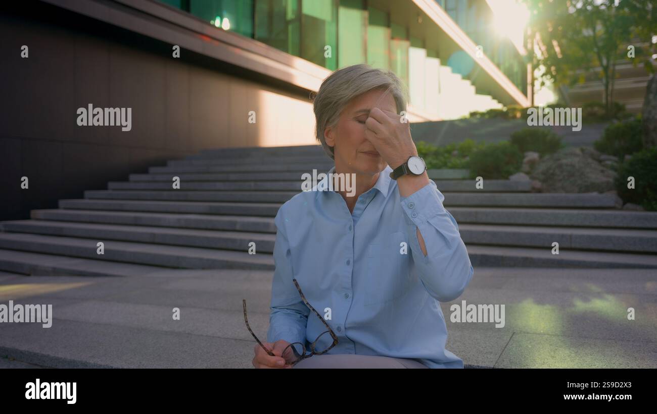 Caucasian ill sick unwell exhausted businesswoman mature mid age tired ...