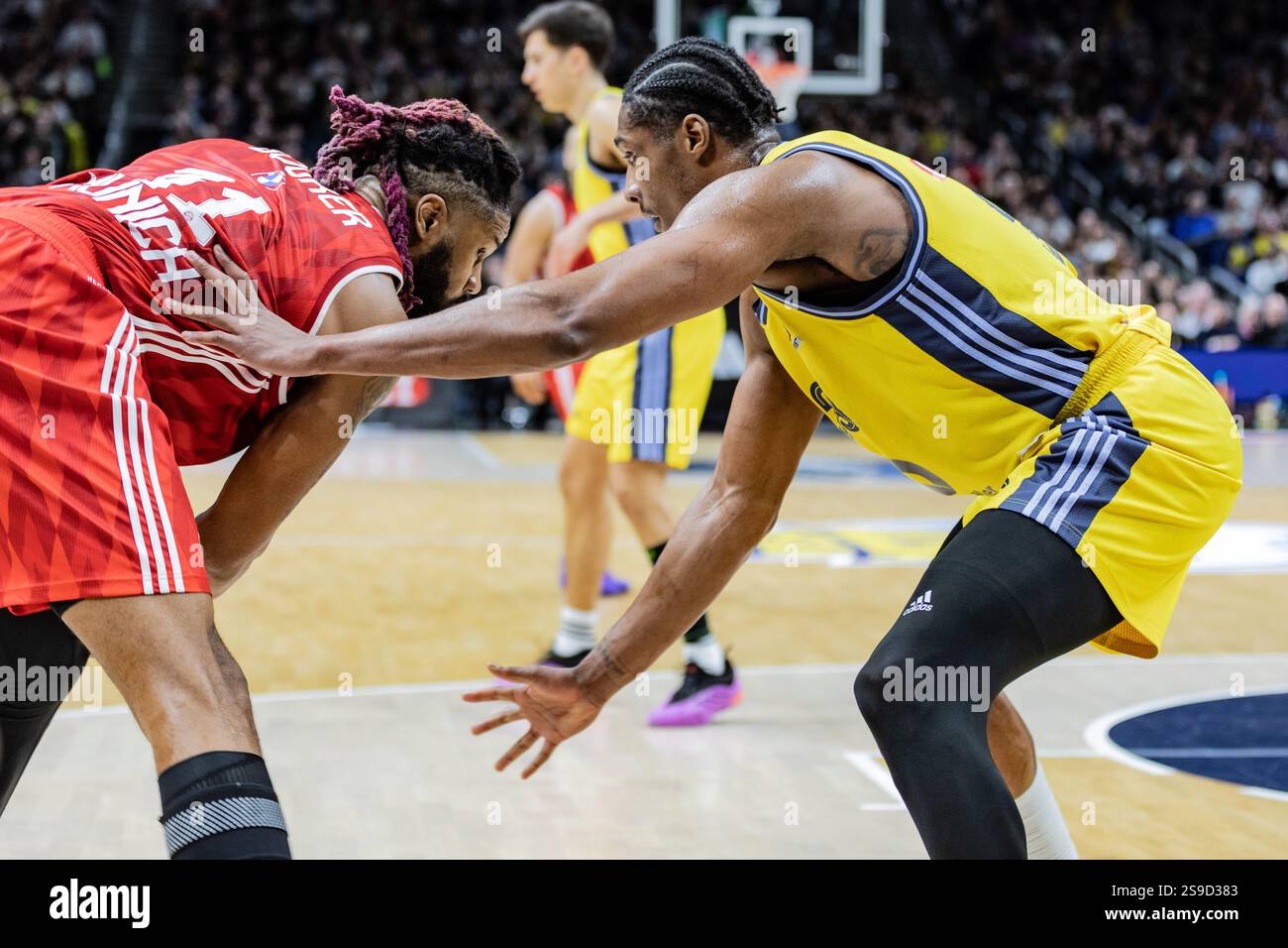 Devin Booker (L) of FC Bayern Munich and David McCormack (R) of Alba ...