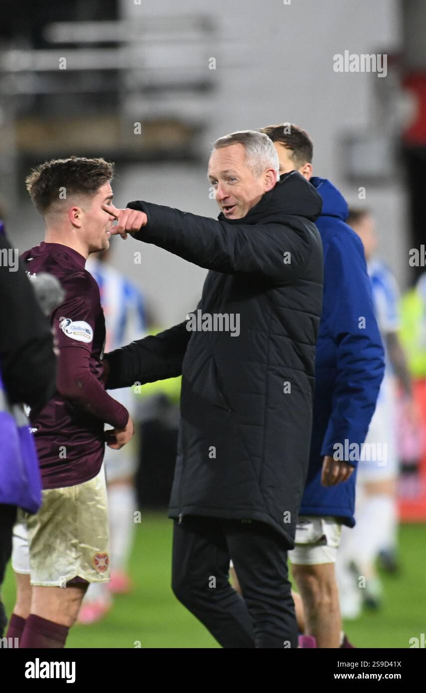 Hearts head coach neil critchley chats with cammy devlin hi-res stock ...