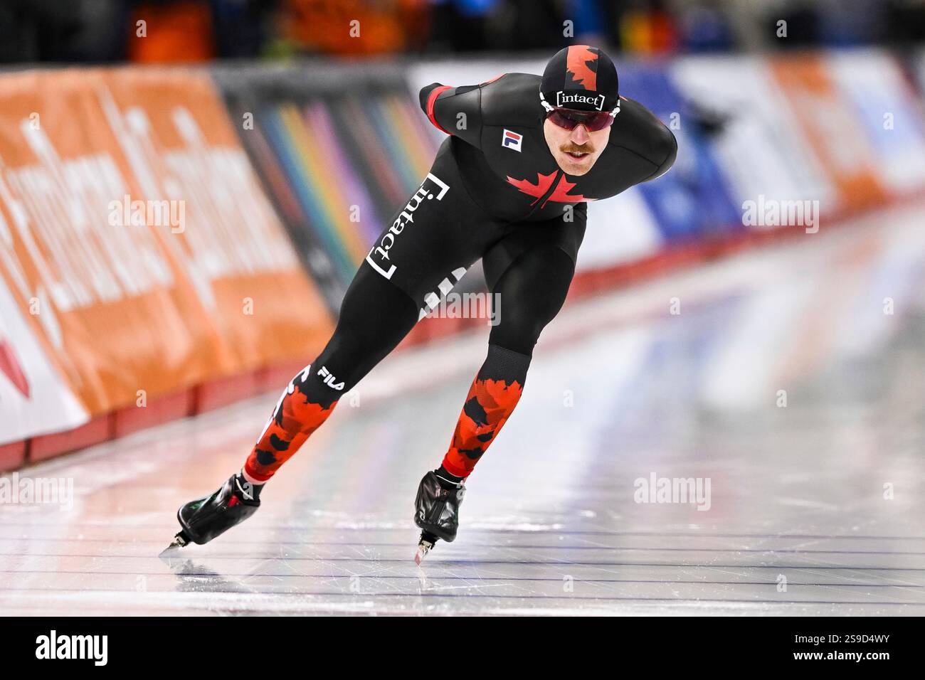 CALAGARY, AB - JANUARY 25: Graeme Fish (CAN) races during the 10000m ...