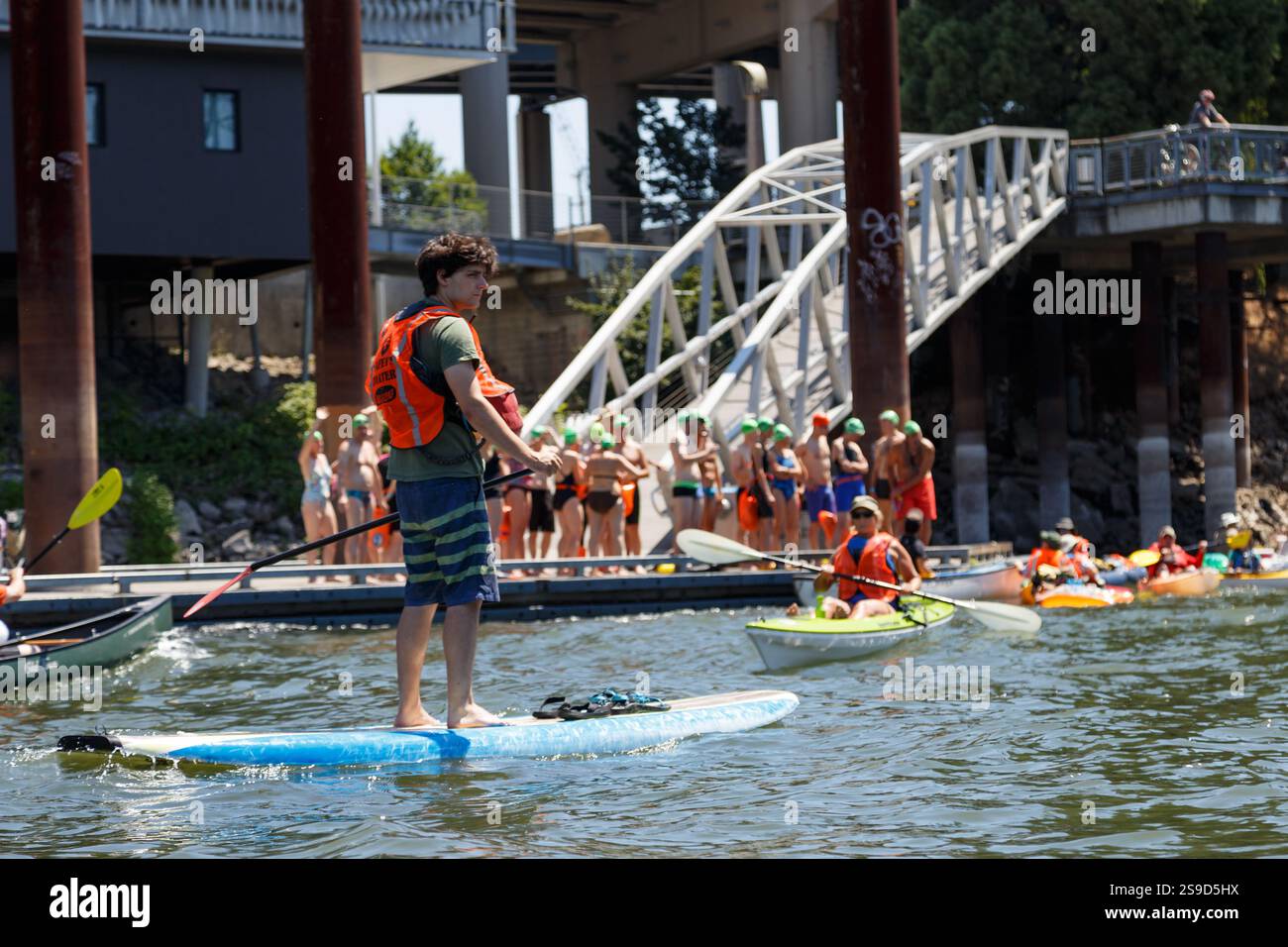 The River Huggers swim across the Willamette River for the The Float 7 ...