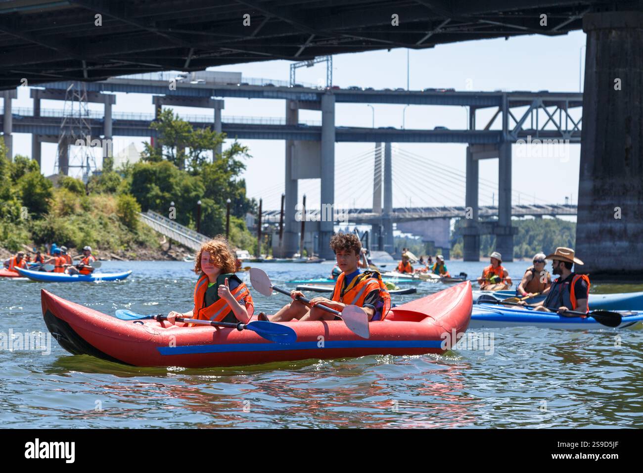 The River Huggers swim across the Willamette River for the The Float 7 ...