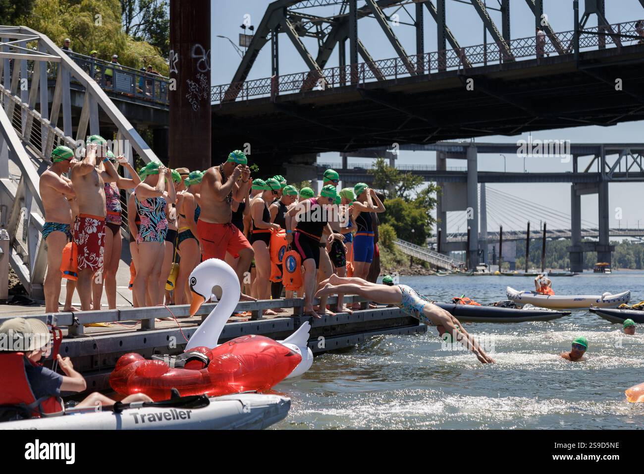 The River Huggers swim across the Willamette River for the The Float 7 Stock Photo - Alamy