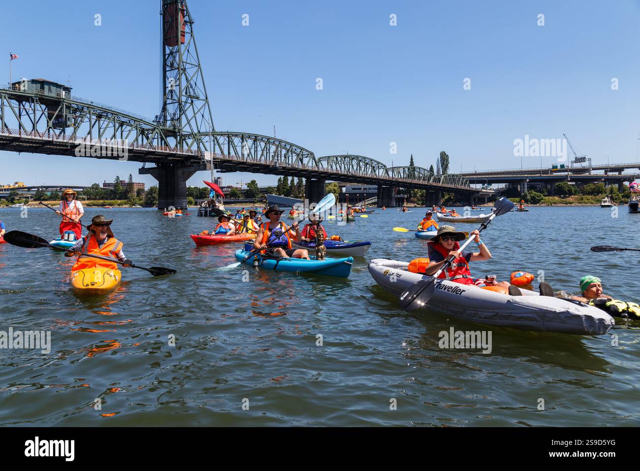 The River Huggers swim across the Willamette River for the The Float 7 ...