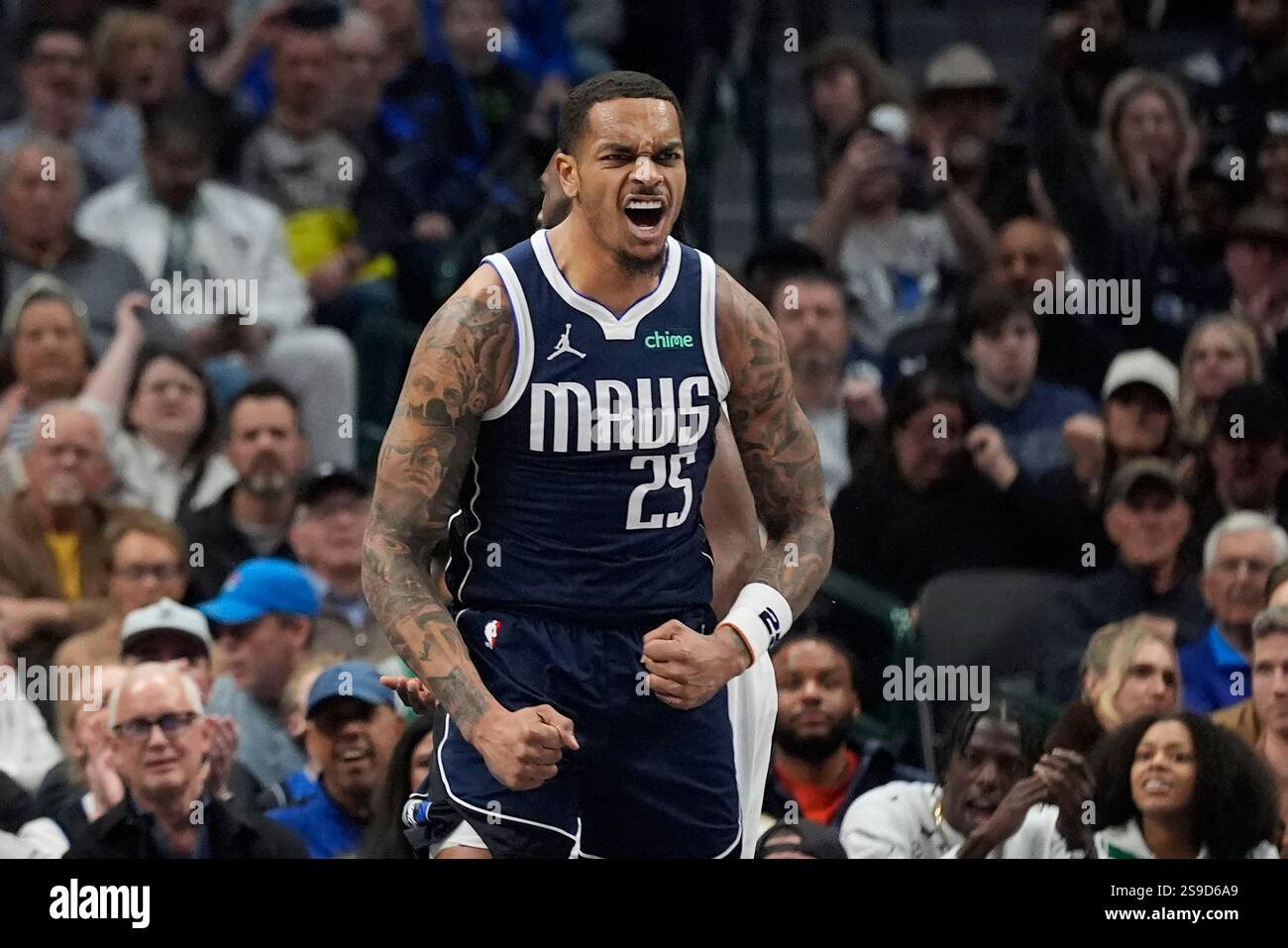 Dallas Mavericks forward P.J. Washington reacts after scoring during ...
