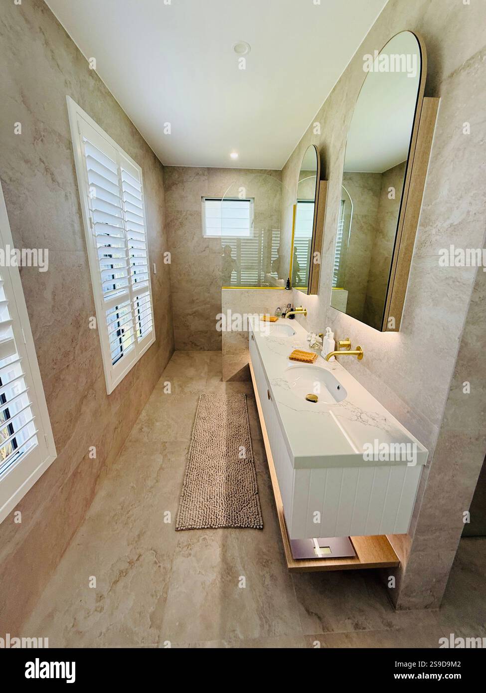 Elegant Ensuite with Natural and Neutral Lighting Stock Photo - Alamy