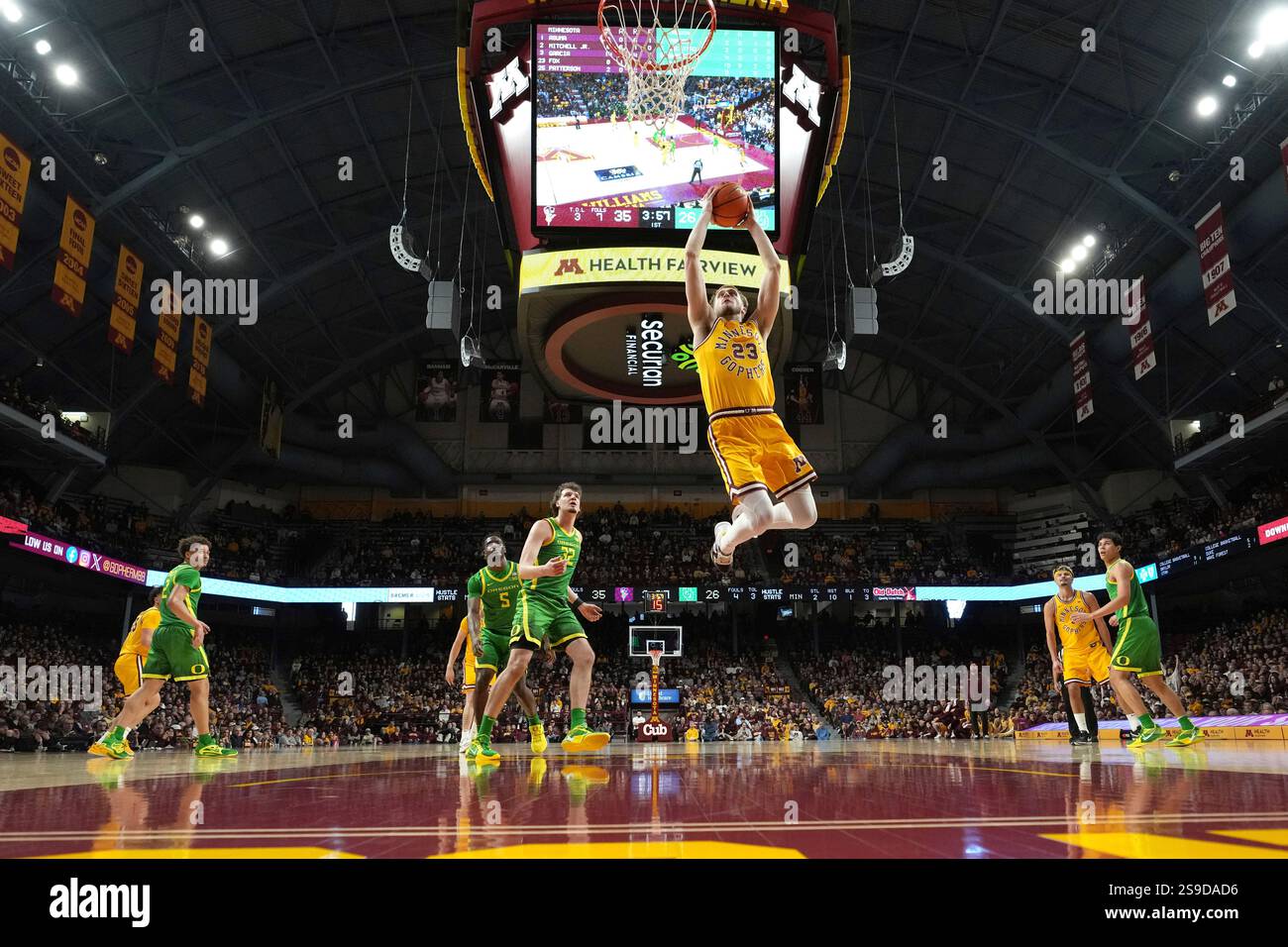 Minnesota forward Parker Fox (23) goes up for a dunk during the first ...