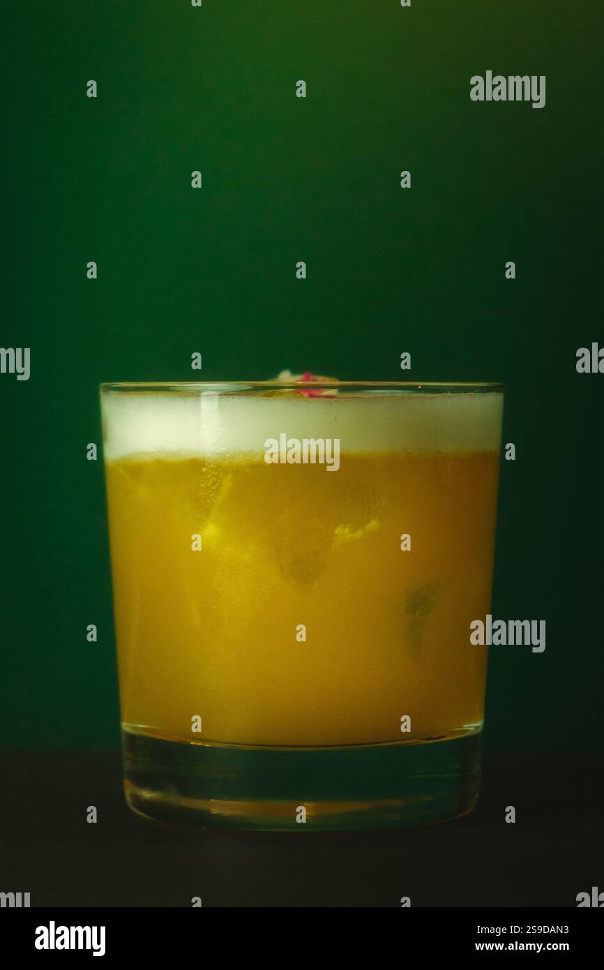 Vibrant Yellow Cocktail with Foam in Lowball Glass Refreshing Drink ...