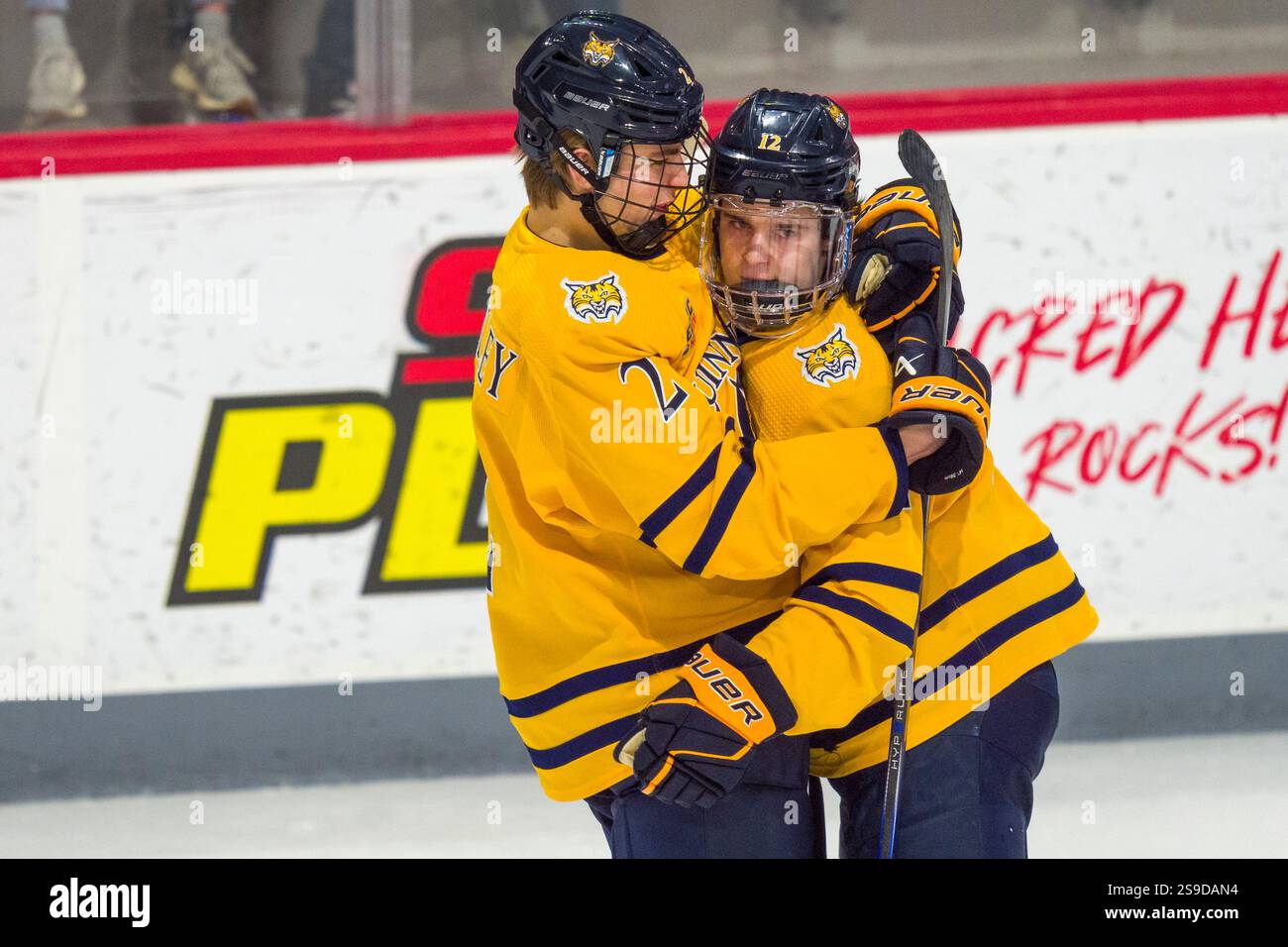 January 25, 2025: Quinnipiac Bobcats Drew Hockley, left, congratulates ...