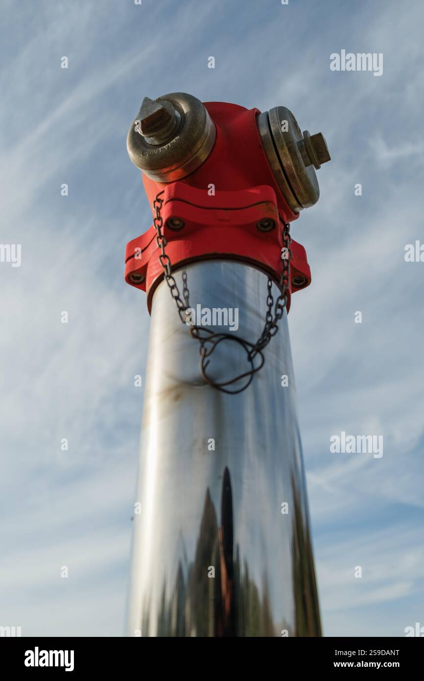 Shiny Red Fire Hydrant Against Blue Sky Stock Photo - Alamy