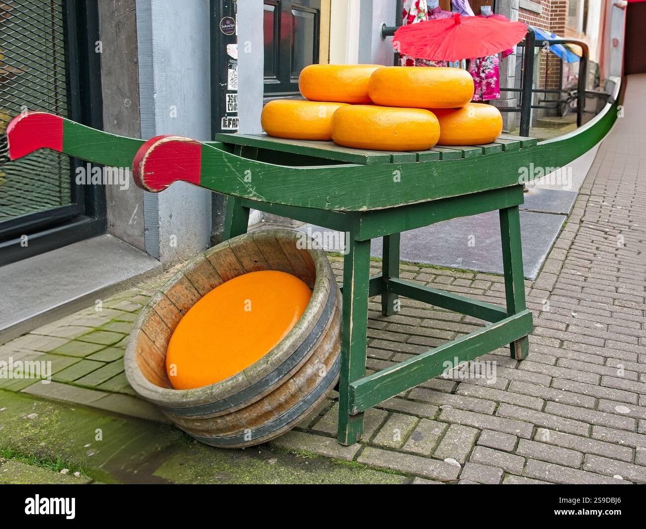 Brightly Colored Cheese Wheels on a Traditional Dutch Wooden Cart Stock ...