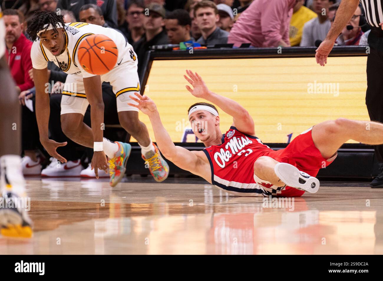 Mississippi's Sean Pedulla, right, passes the ball in front of Missouri ...