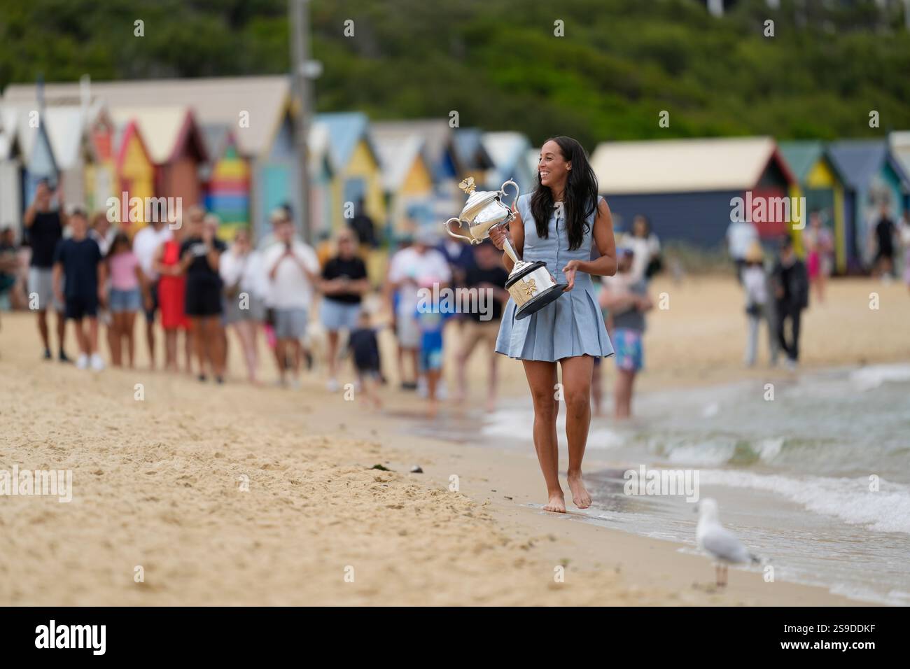 Madison Keys of the U.S. walks along Brighton Beach carrying the Daphne ...