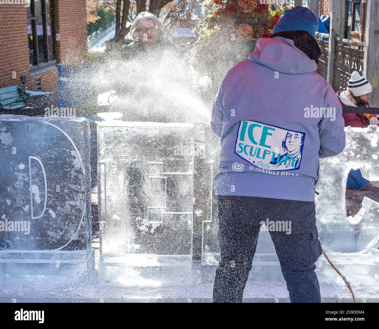 Ice sculptor artists give an ice carving demonstration - Ice Sculpture ...