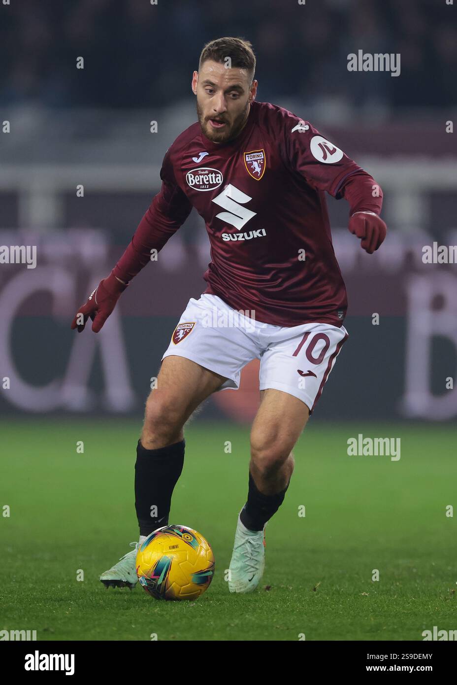 Turin, Italy, 24th January 2025. Nikola Vlasic of Torino FC lines up a ...