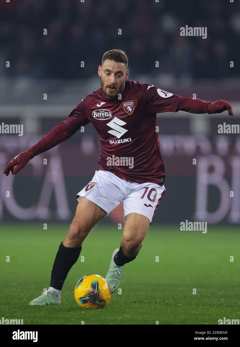 Turin, Italy, 24th January 2025. Nikola Vlasic of Torino FC lines up a ...