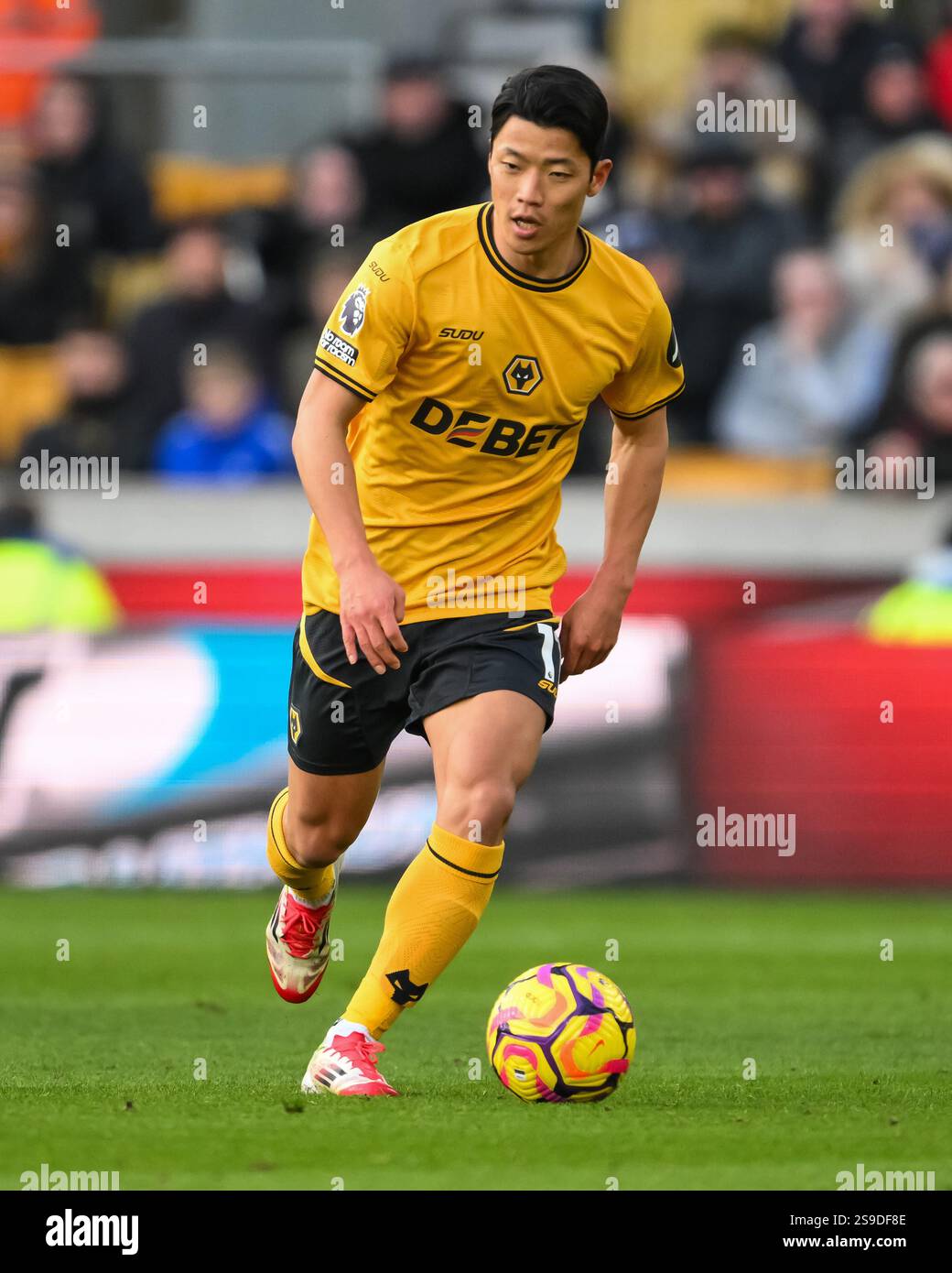 Hwang Hee-Chan of Wolverhampton Wanderers makes a break with the ball ...