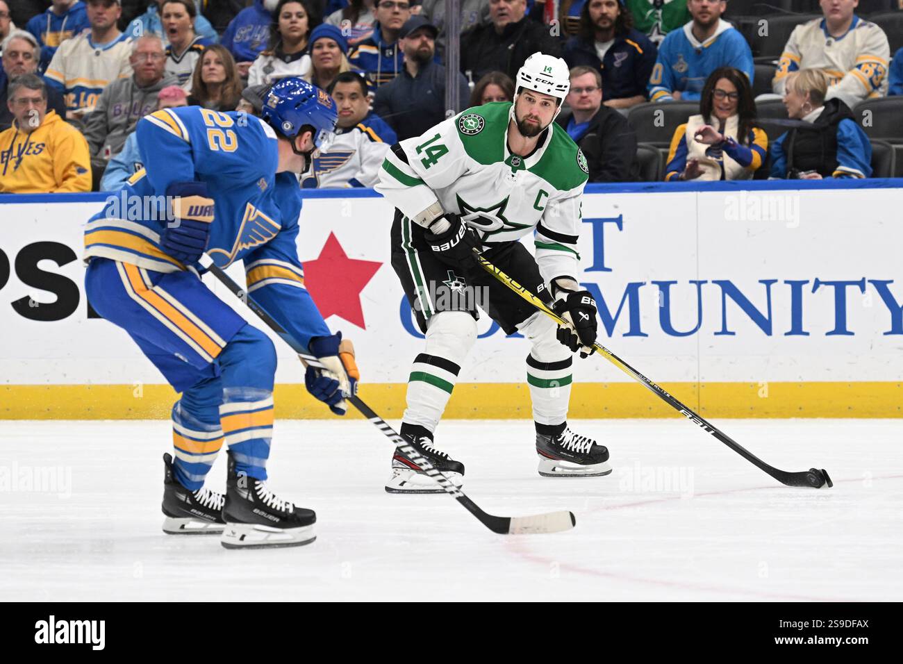 St. Louis Blues' Ryan Suter (22) defends against Dallas Stars' Jamie ...
