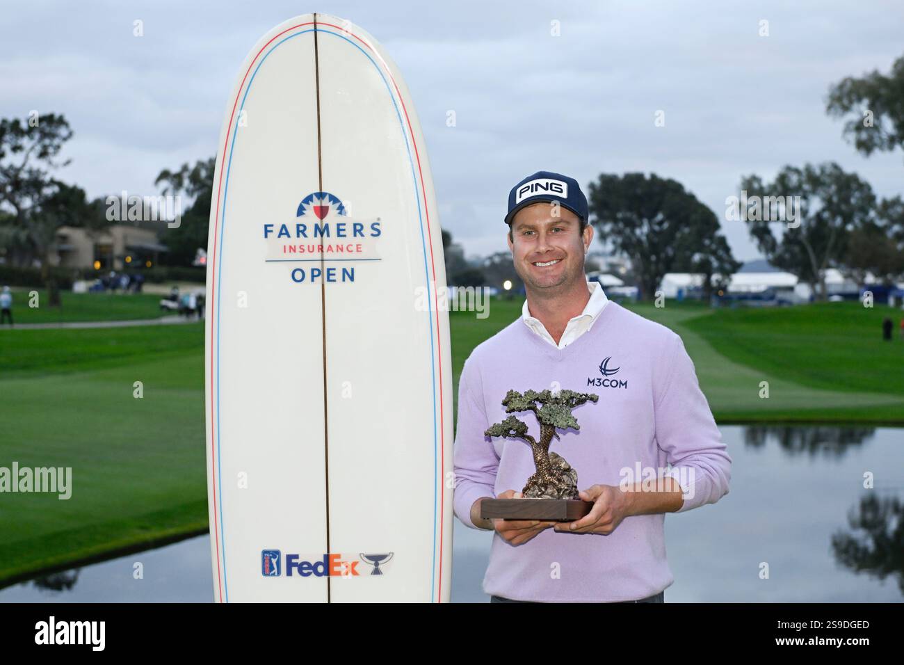 Harris English holds up the trophy after winning the Farmers Insurance ...