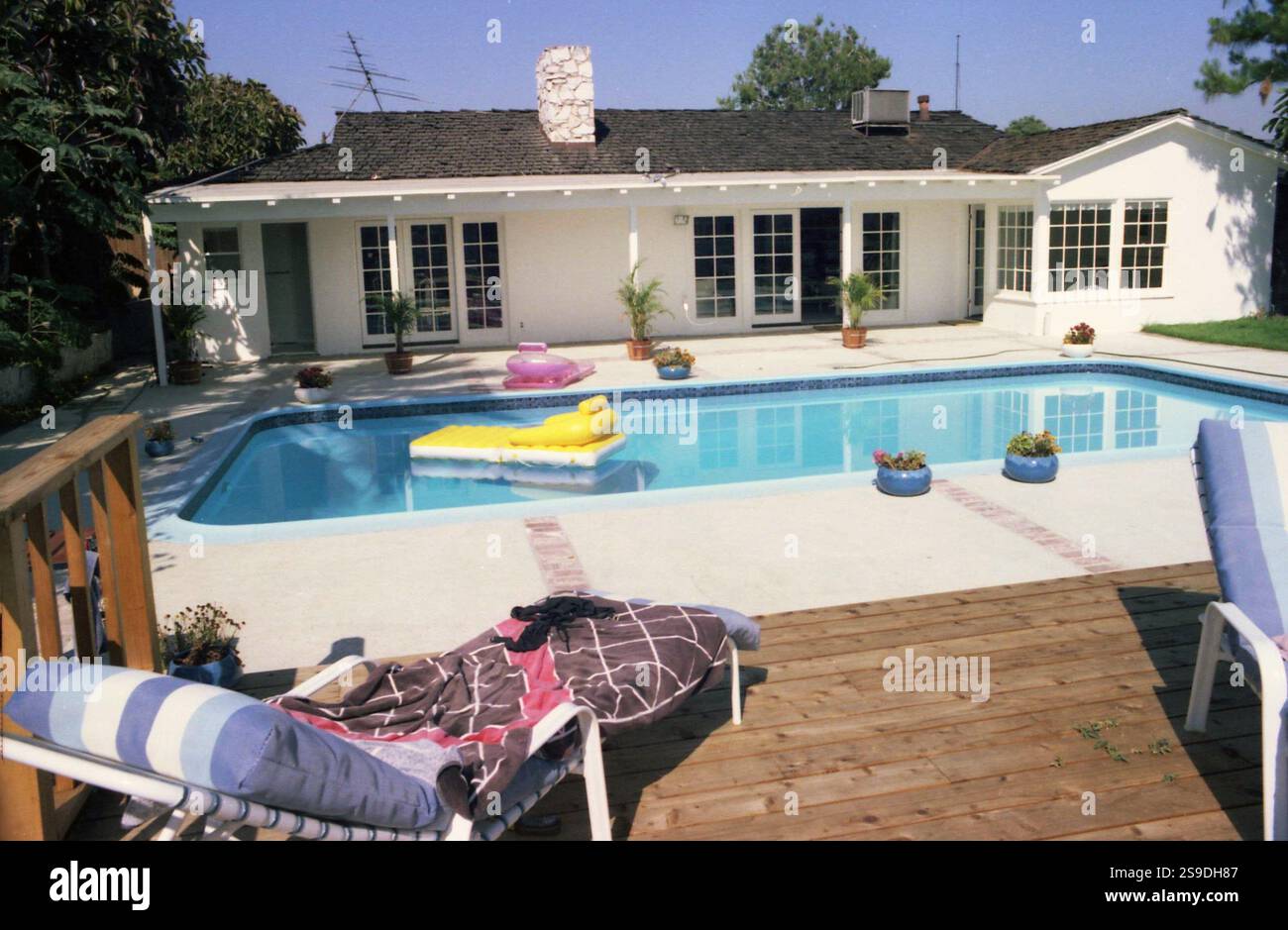 Los Angeles, CA, USA, cca. 1992. Backyard of a house, with inflatables ...