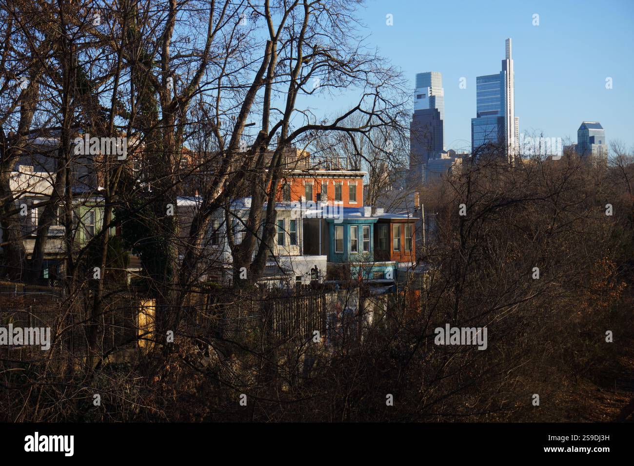 The towers of Center City Philadelphia rise beyond rowhomes along ...