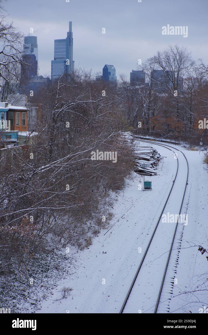 Snow blankets a freight rail line in Fairmount Park near Center City ...