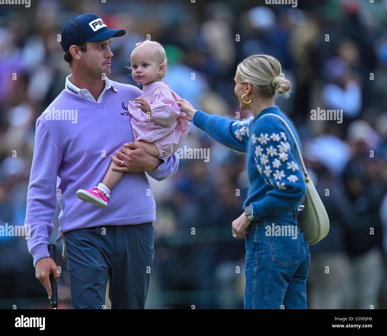 January 25, 2025: Harris English celebrates with his wife Helen and ...