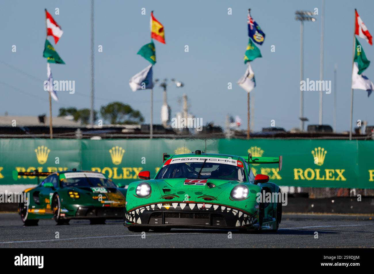DAYTONA BEACH, FL - JANUARY 25: The #77 AO Racing Porsche 911 GT3 R ...