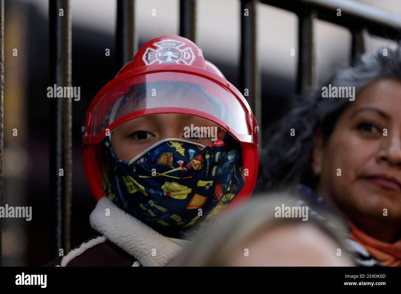 A child dressed as a firefighter watch the first Heroic Fire Department ...
