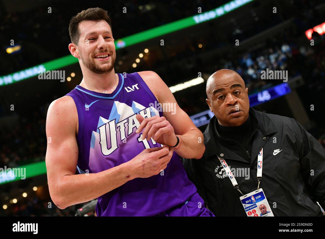 Utah Jazz forward Drew Eubanks (15) is escorted off the court by ...