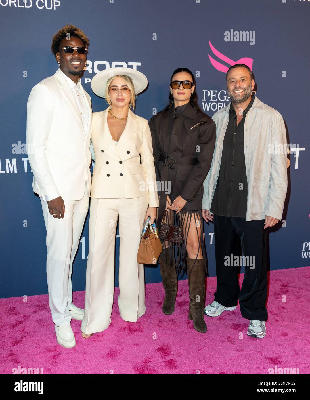 HALLANDALE, FLORIDA - JANUARY 25: Paul Pogbq, guest, Isabella and David ...