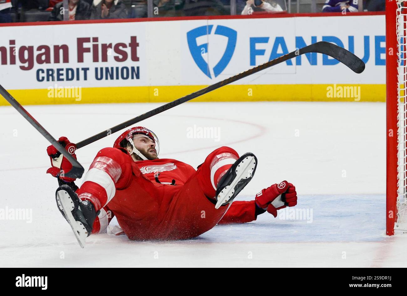 Detroit Red Wings center Michael Rasmussen (27) slides into the goal ...