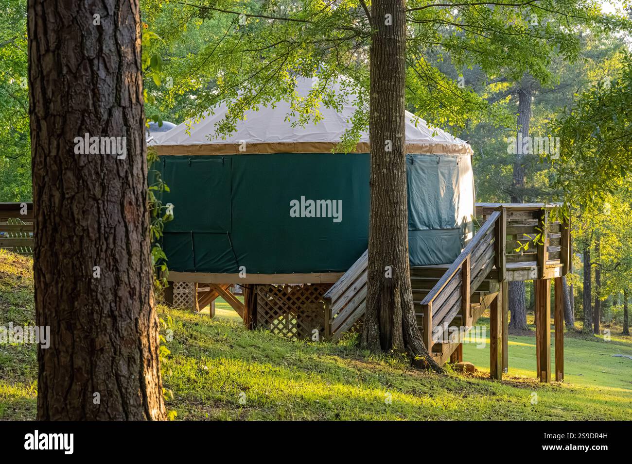 Yurt campsite at sunset on High Falls Lake at High Falls State Park in ...