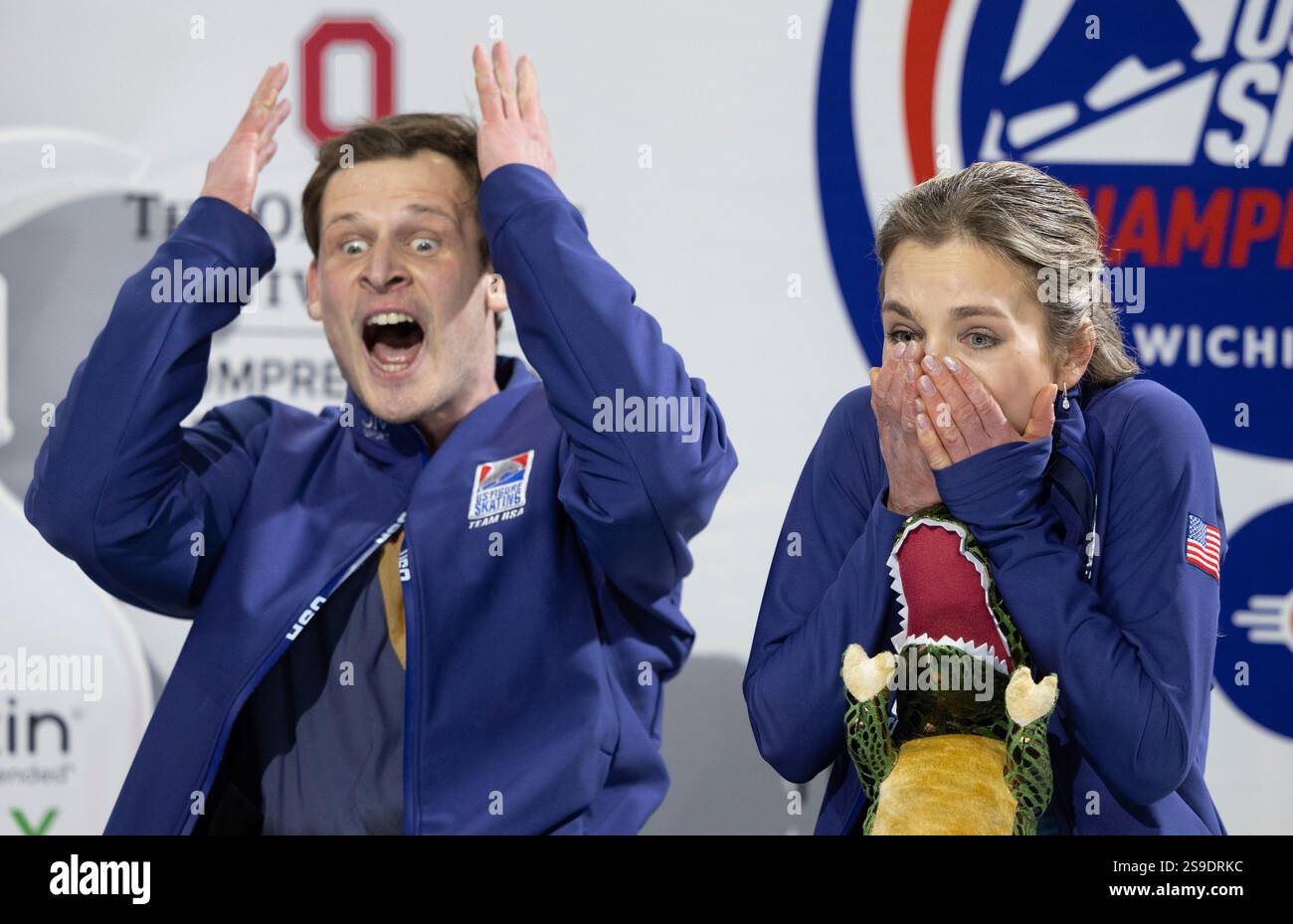 Alisa Efimova, right, and Misha Mitrofanov, left, react after seeing ...