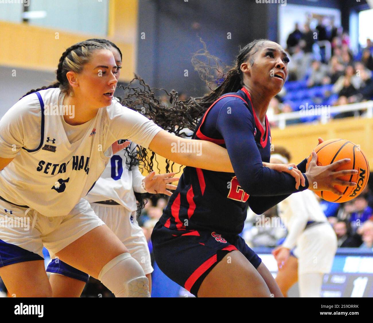 Seton Hall's Faith Masonius (3) and St. John's Nevaeh Wingate (22 ...