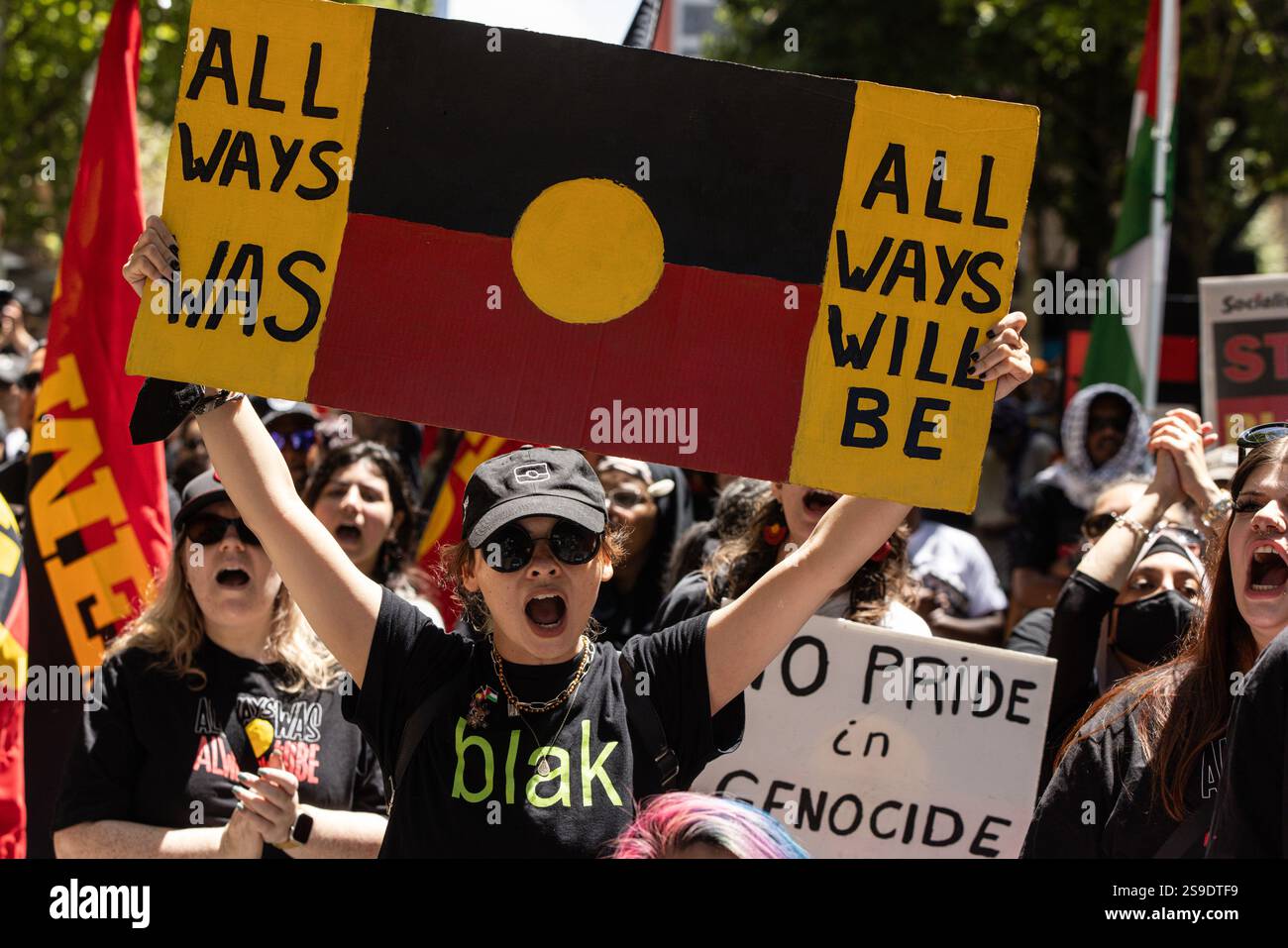 People march towards Flinders Street Station during an Invasion Day ...