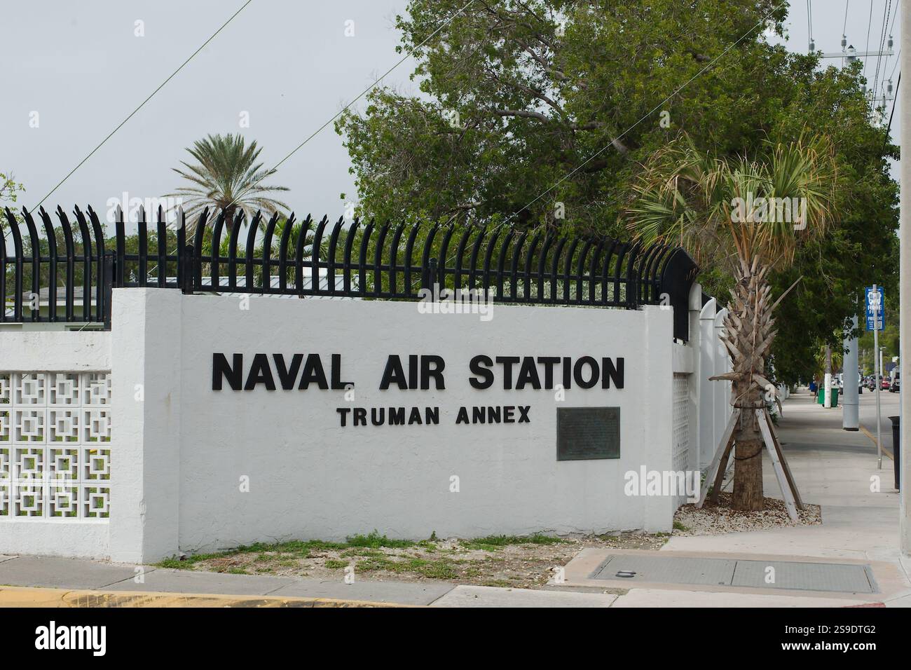 Outside view Sign on white wall Naval Air Station Truman Annex near ...