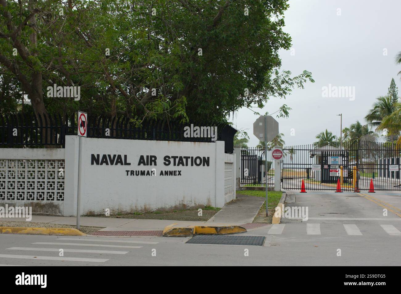 Outside view Sign on white wall Naval Air Station Truman Annex near ...