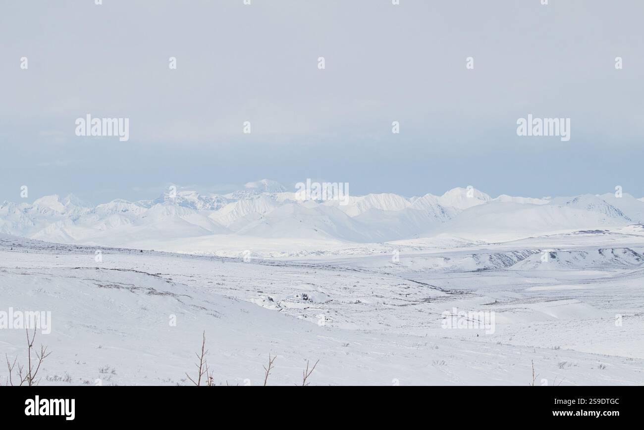 Mountain chain covered in snow on the Denali Highway on a spring day in ...