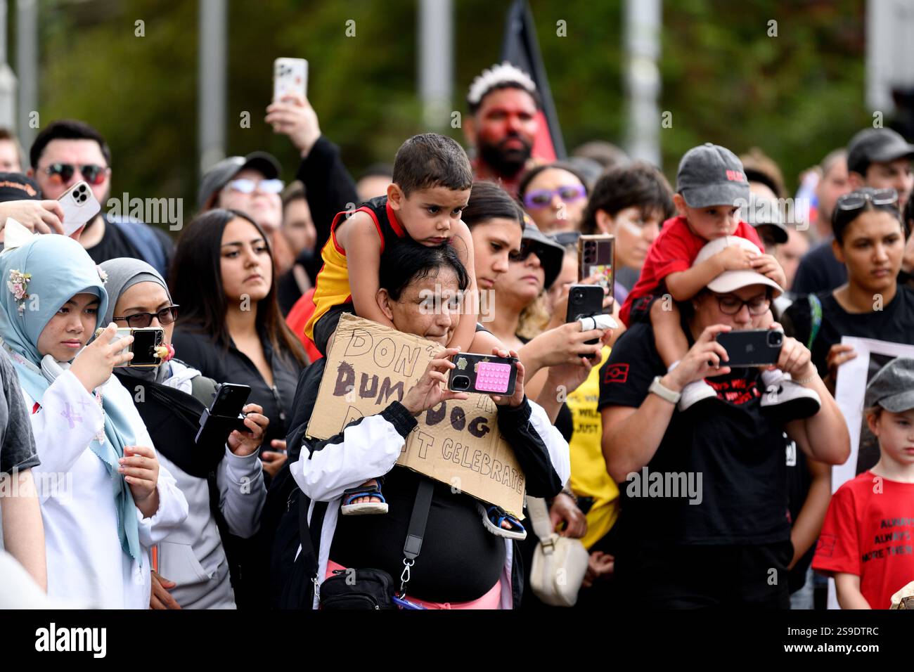 Participants walk during an Invasion Day rally in Sydney, Sunday ...