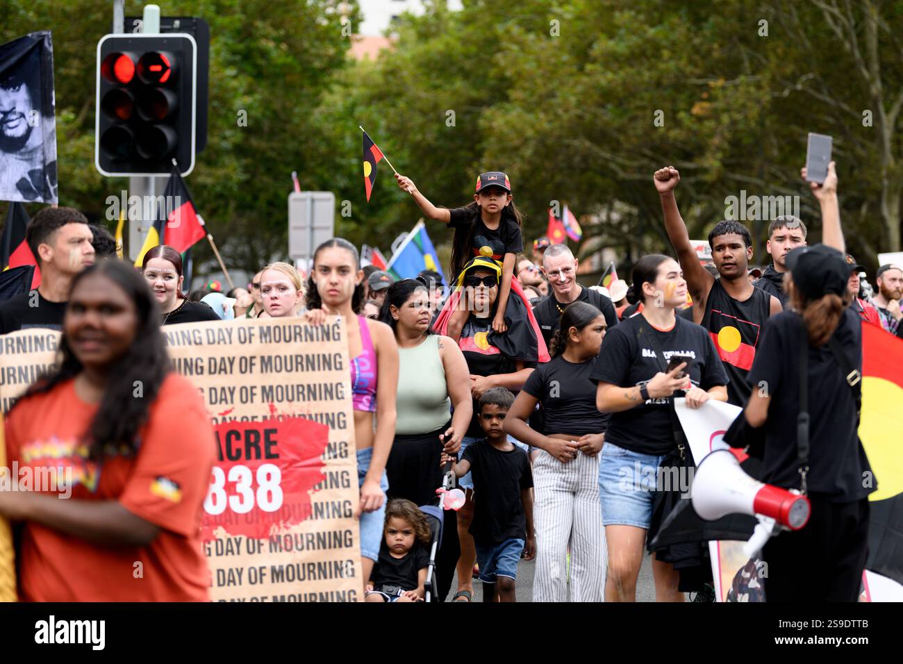 Participants walk during an Invasion Day rally in Sydney, Sunday ...