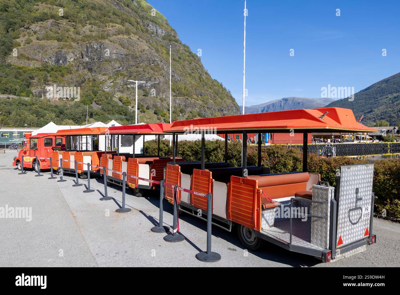 Flam village Norway, tourist Land Train parked beside Aurlandsfjord in ...