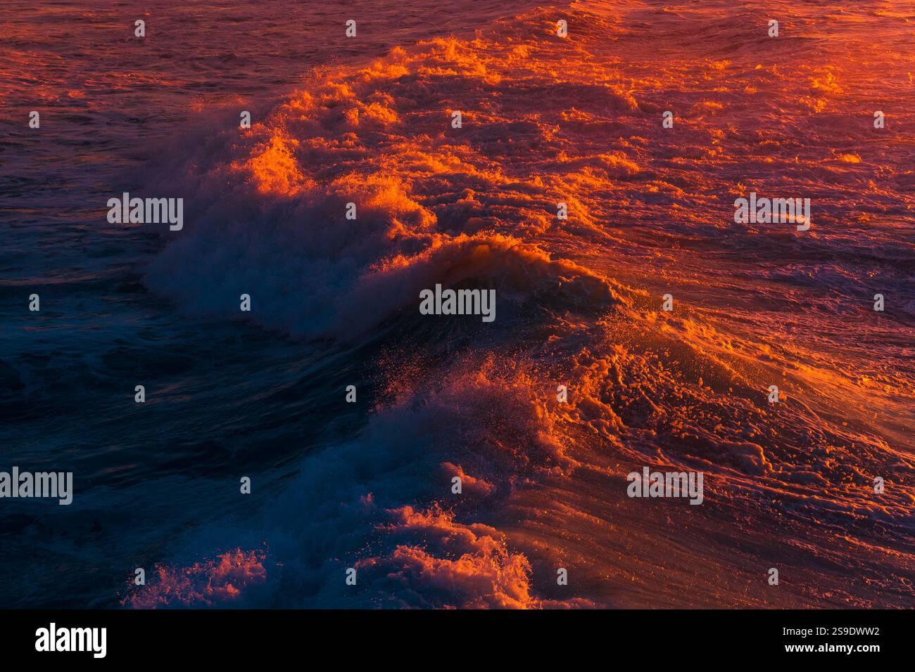 Texture of the water surface wave against a colorful Purple and Orange ...
