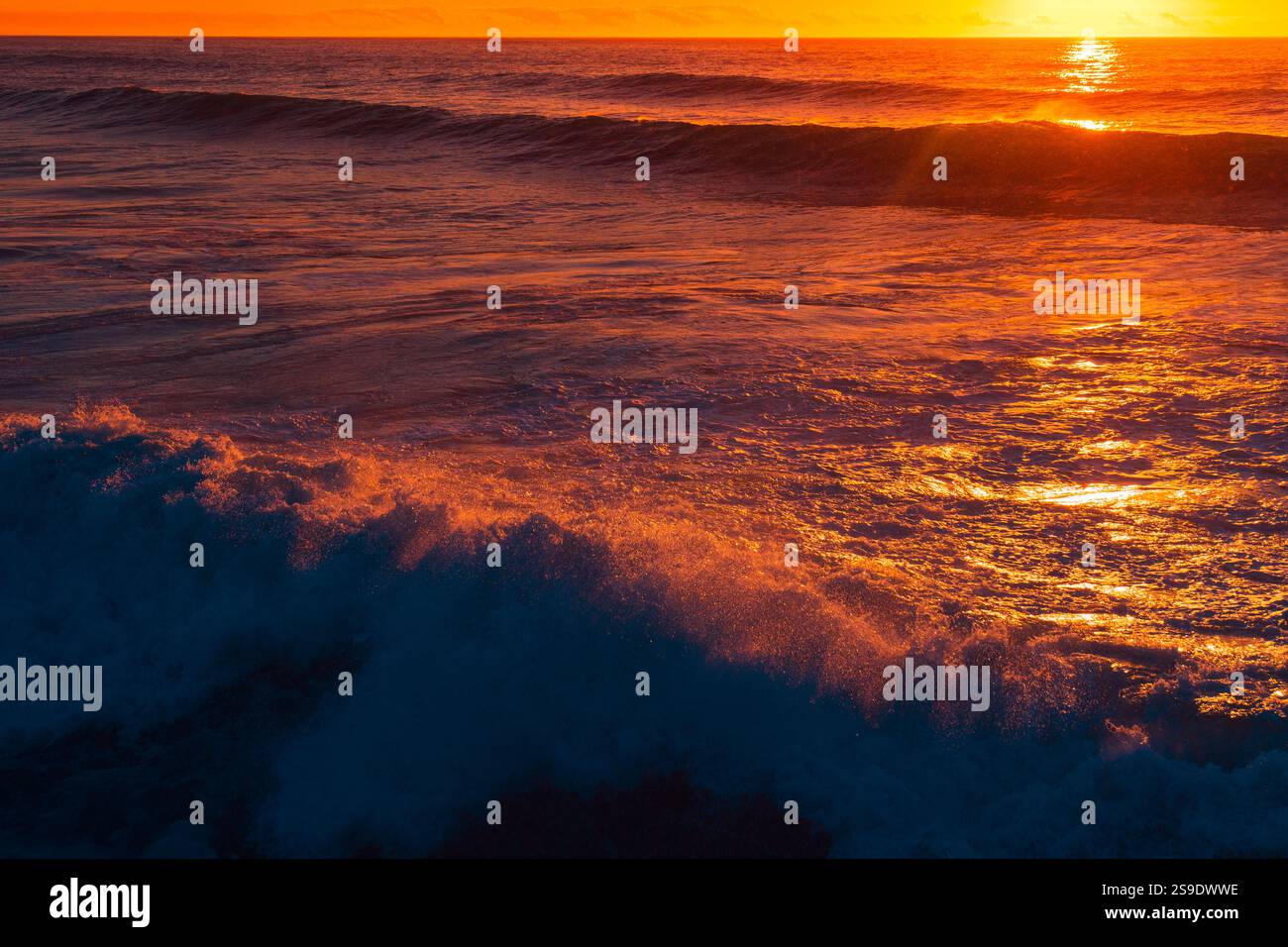 Texture of the water surface wave against a colorful Purple and Orange ...