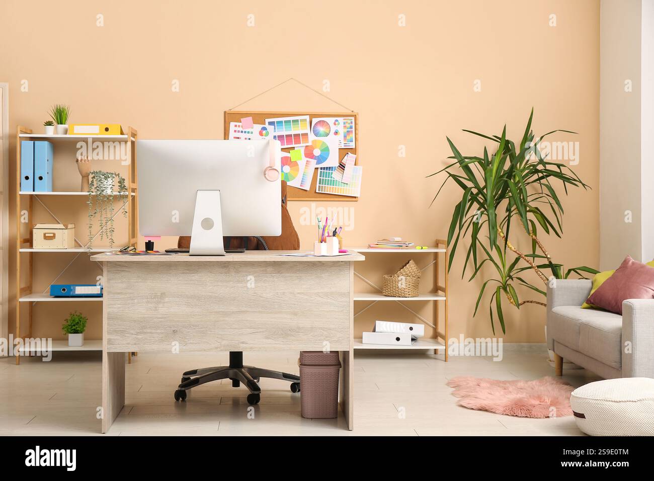 Interior of designer's office with workplace and shelf units Stock ...