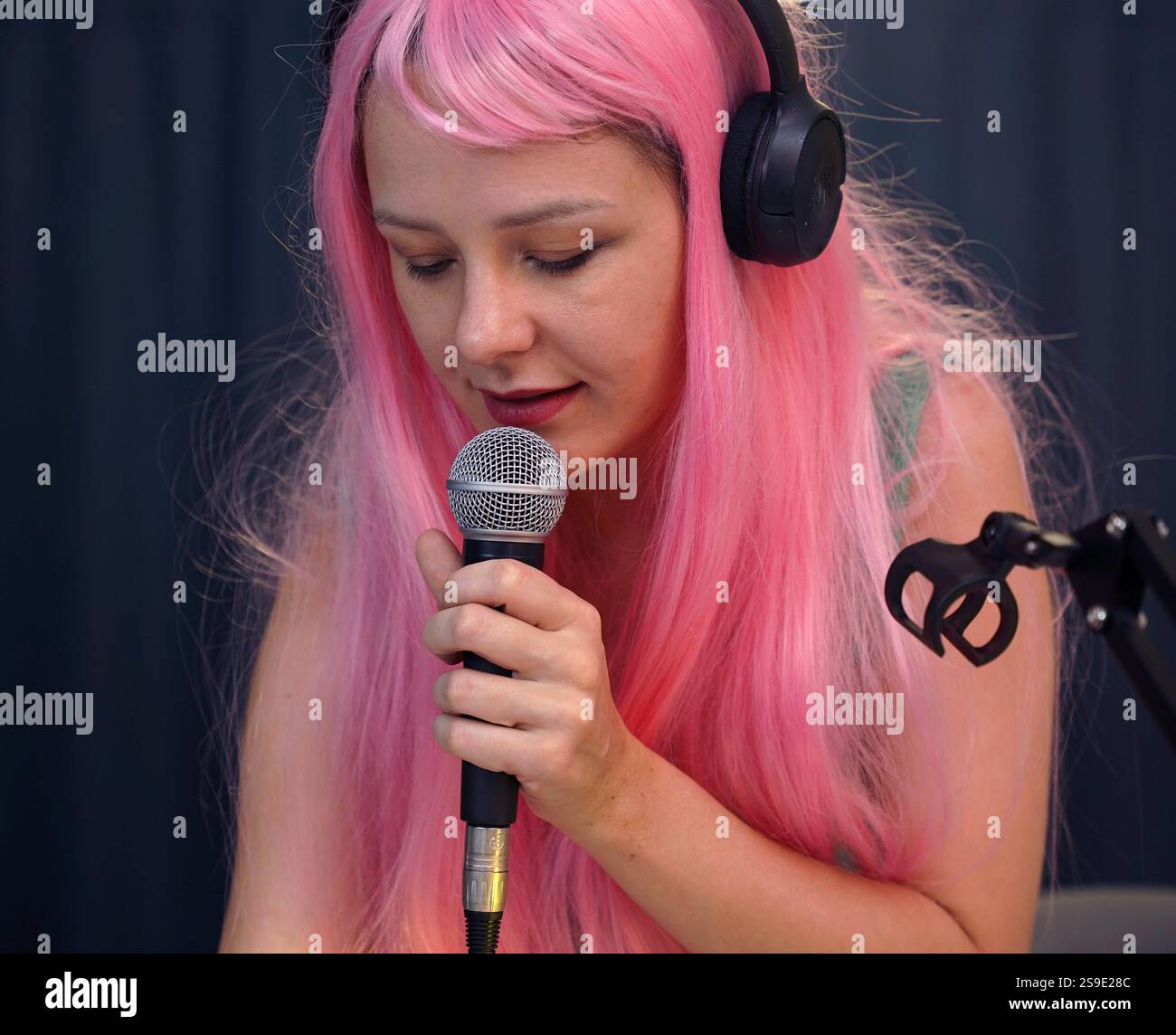 Beautiful young singer and musician broadcast from her home studio ...