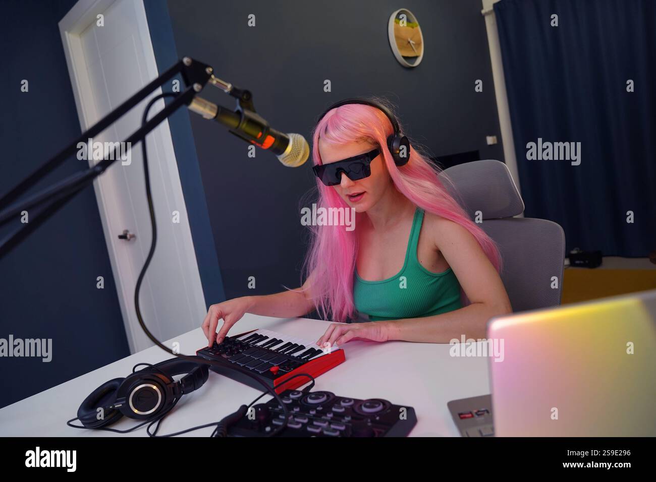 Beautiful young singer and musician broadcast from her home studio ...