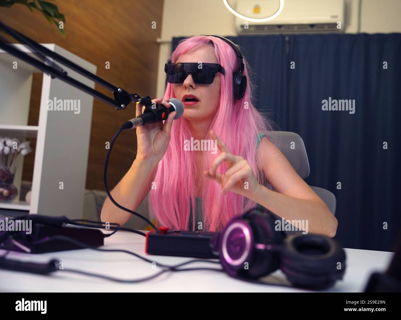 Beautiful young singer and musician broadcast from her home studio ...